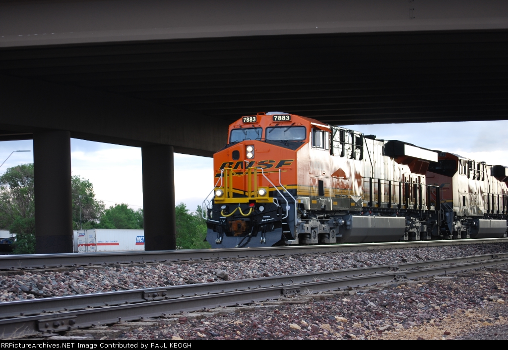 BNSF 7883 and BNSF 7882 cross underneath the Hwy 89 overcrossing as they pull west a Z train on ...